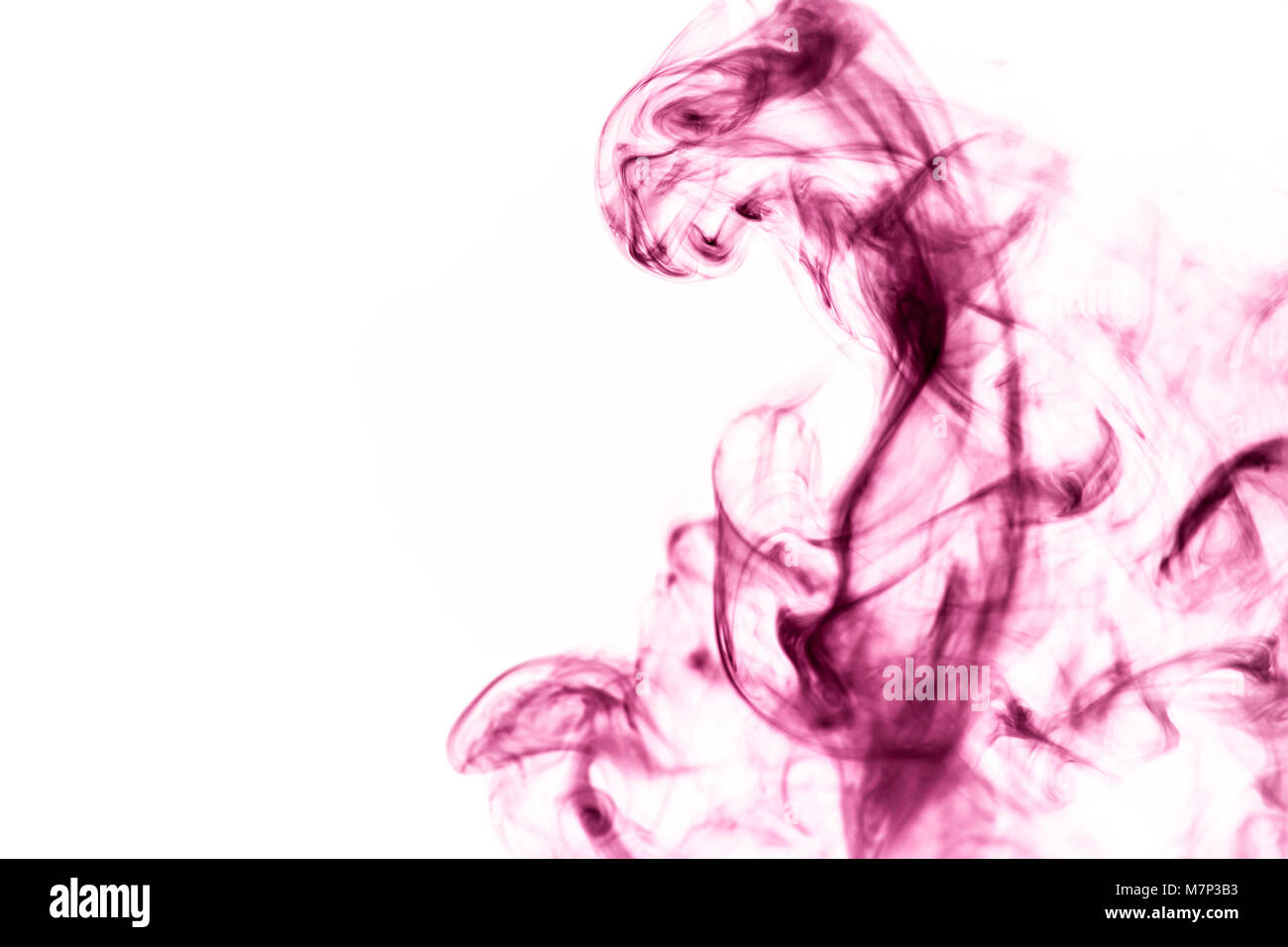 Dense multicolored smoke of burgundy colors on a white isolated ...