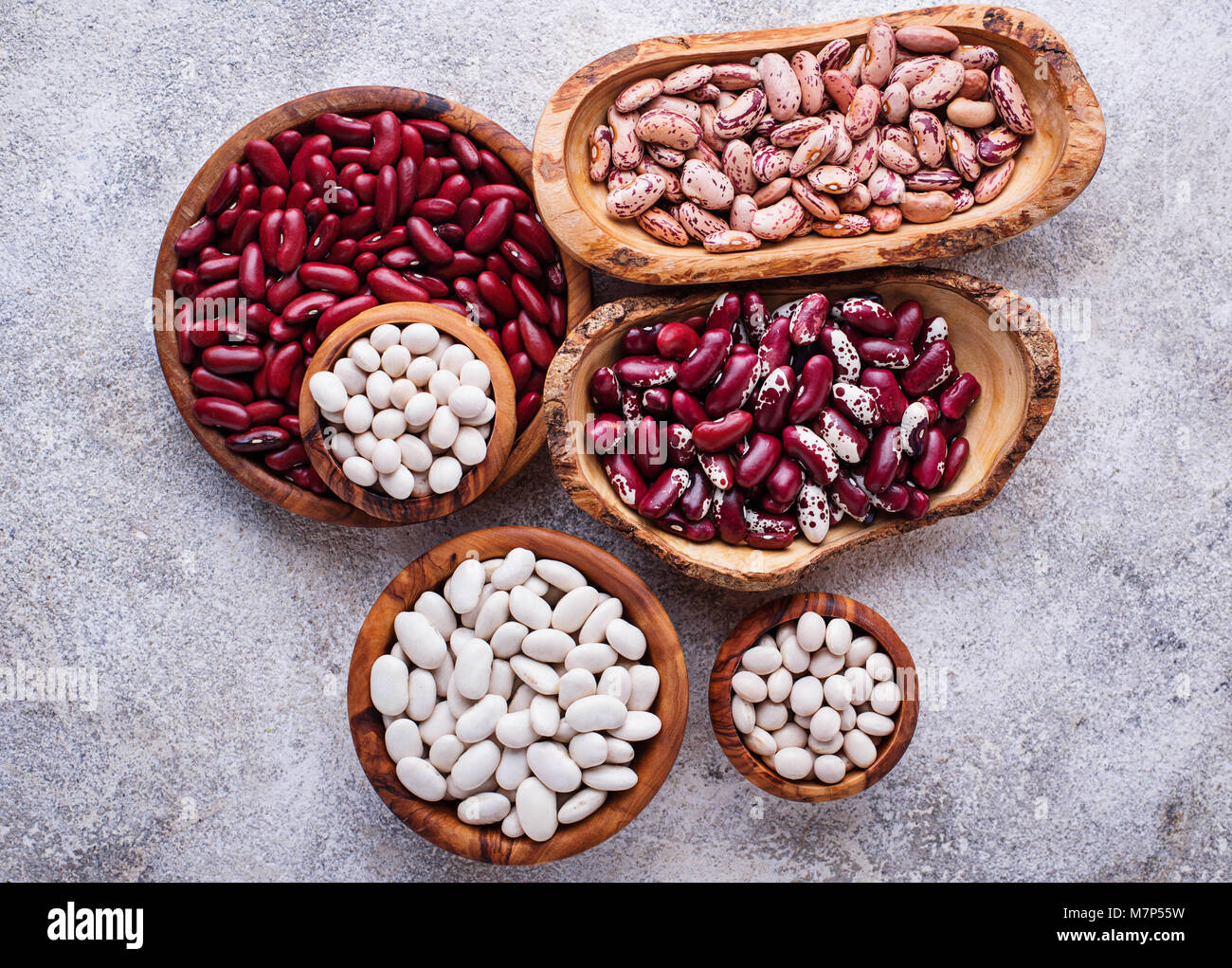 Assortment of various beans in wooden bowls Stock Photo - Alamy