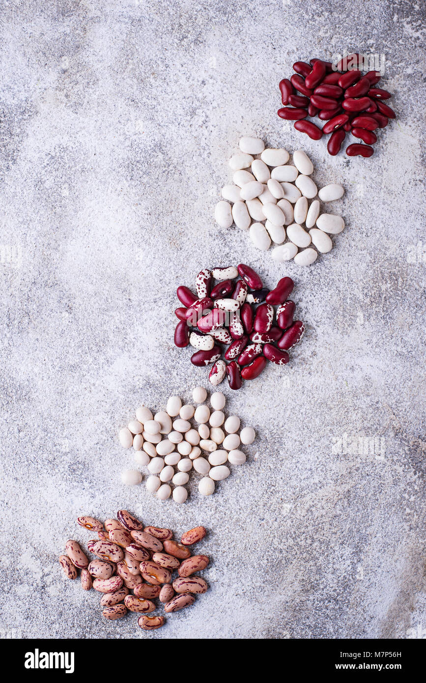 Assortment of various beans on light background Stock Photo - Alamy