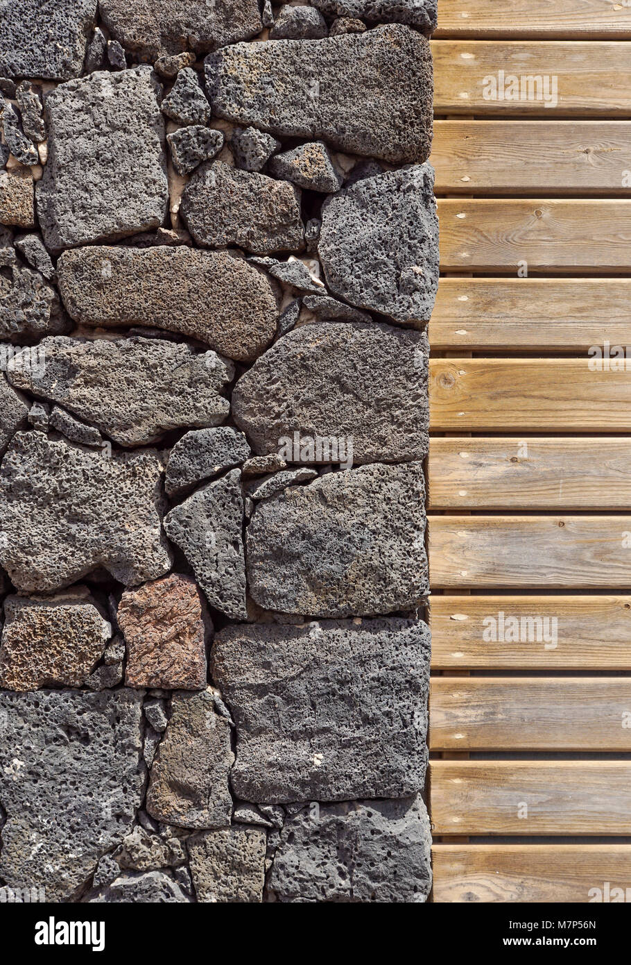 Stone wall background. stone and wood wall, wood texture as background ...