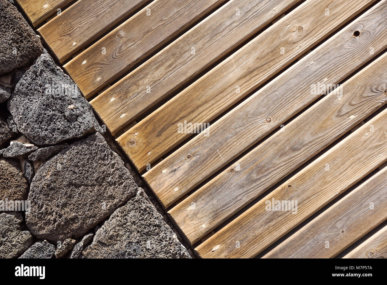 Stone wall background. stone and wood wall, wood texture as background ...