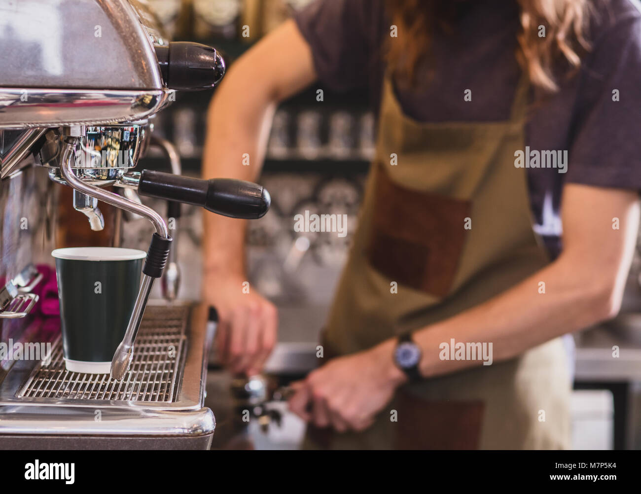 Barista and coffee machine Stock Photo - Alamy