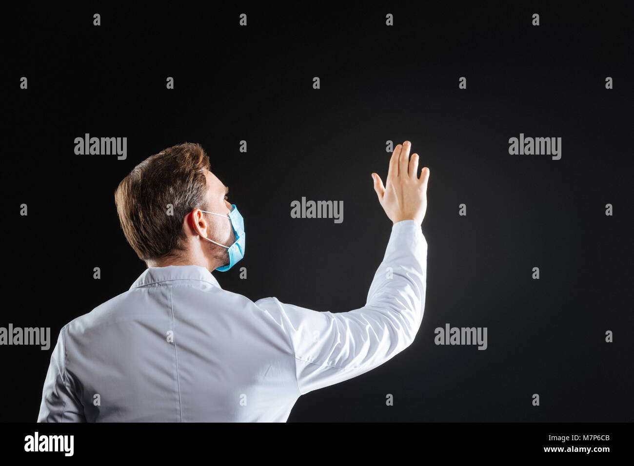 Skilled reliable doctor being alone and working Stock Photo - Alamy