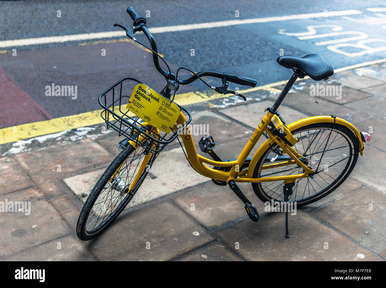 An Ofo dockless bicycle on the pavement, Central London, England, UK ...