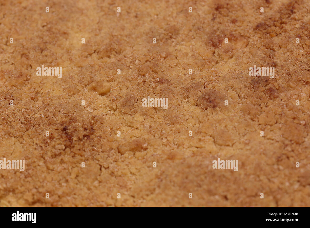 Crumble topping background on an apple crumble Stock Photo - Alamy