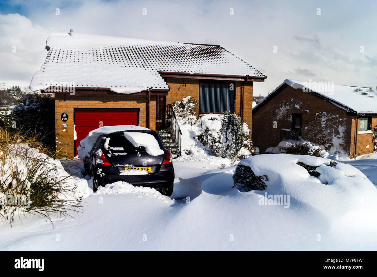 Heavy snow covering on garden hi-res stock photography and images - Alamy