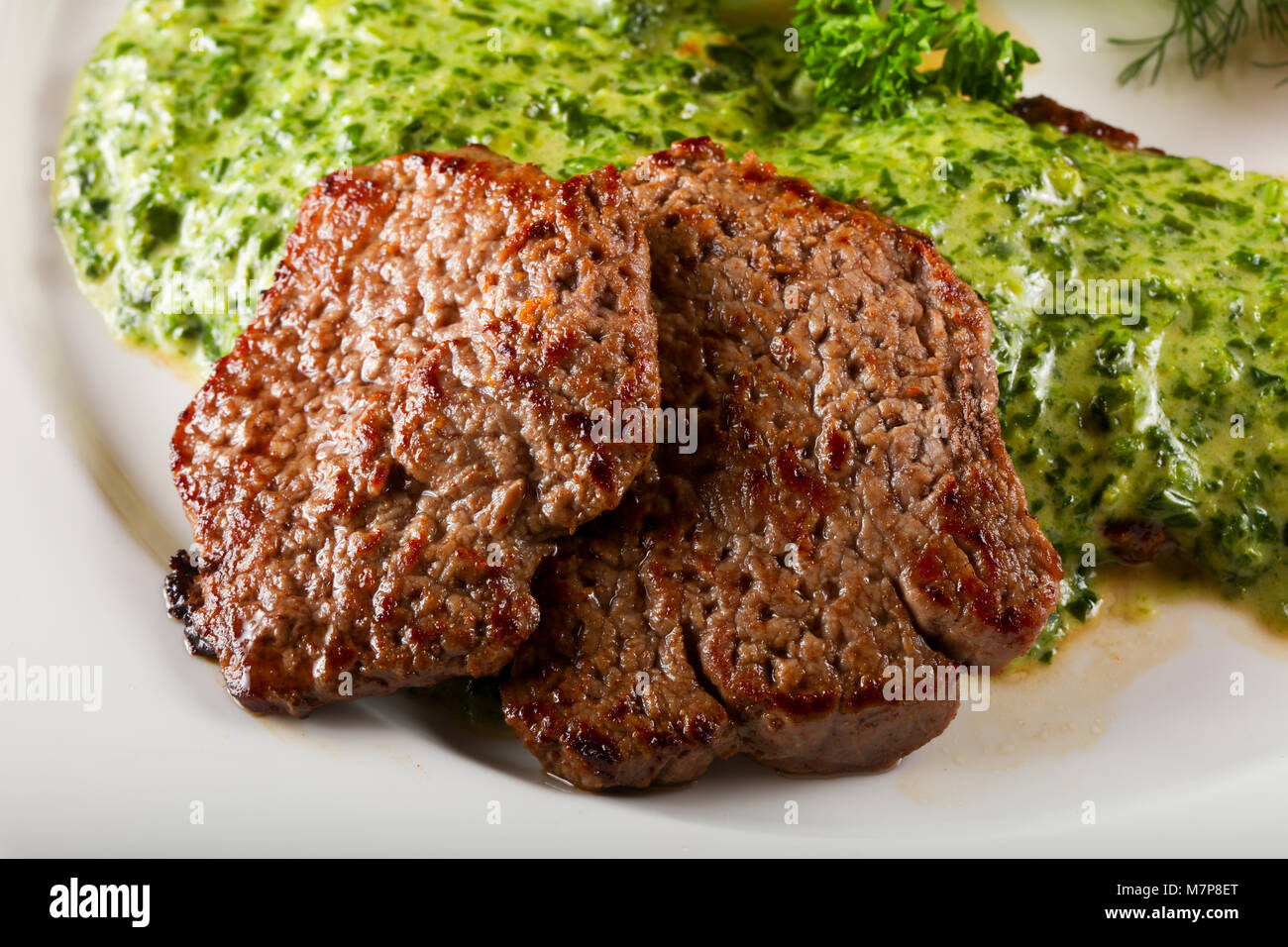 Beef with spinach mousse Stock Photo - Alamy