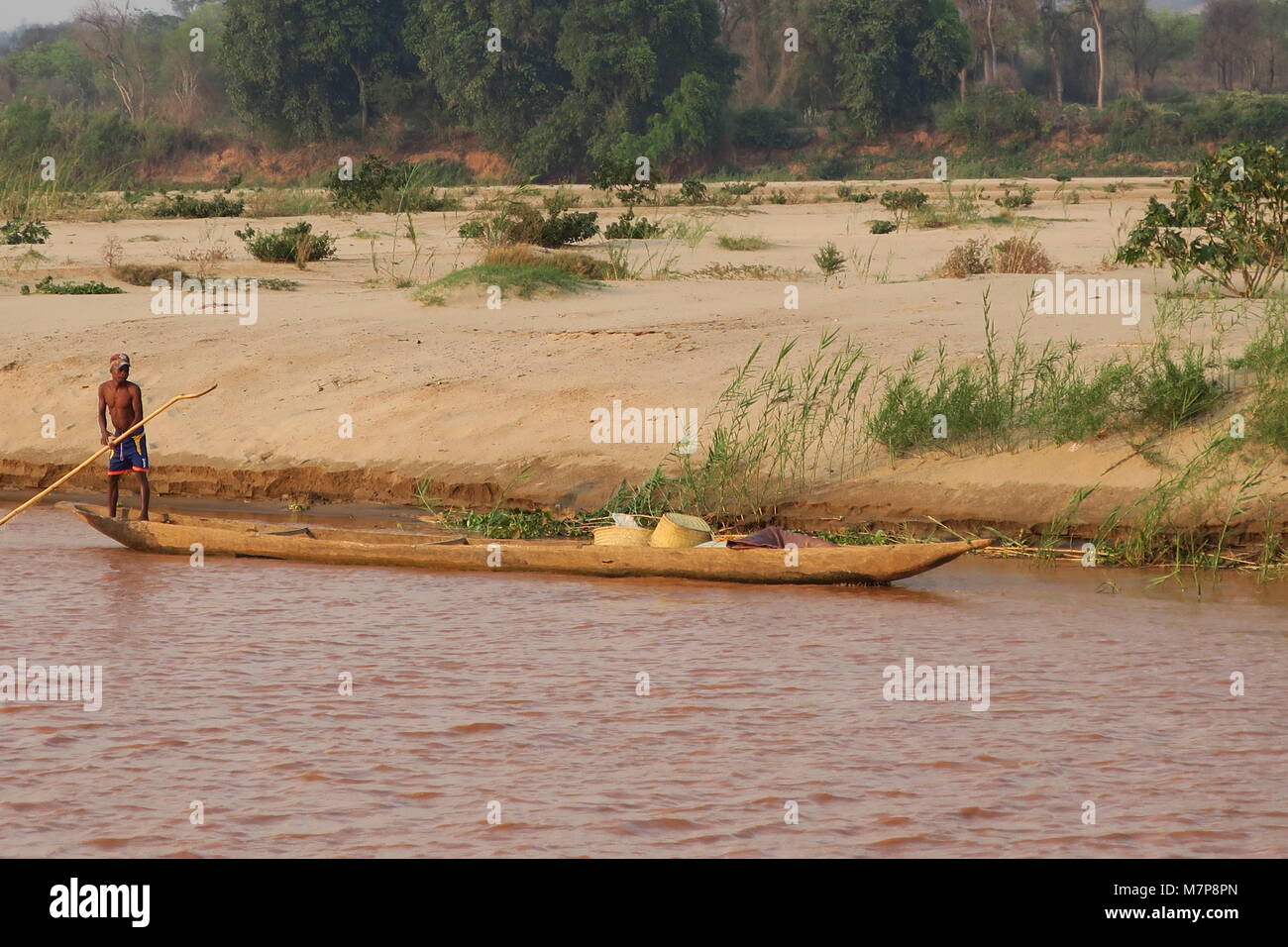 Pirogue, dugout, canoe on Tsiribihina river, Madagascar Stock Photo - Alamy