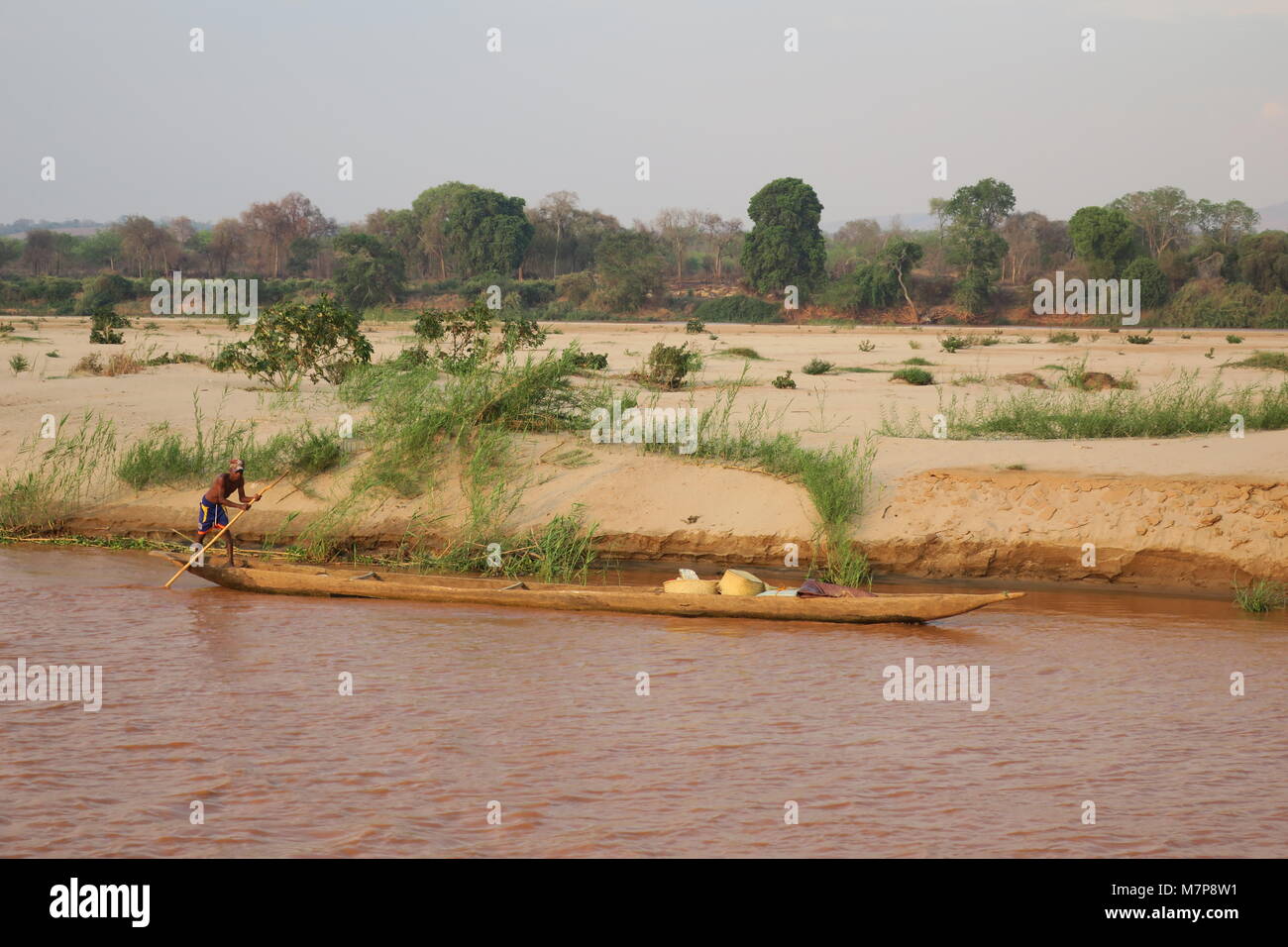 Pirogue, dugout, canoe on Tsiribihina river, Madagascar Stock Photo - Alamy
