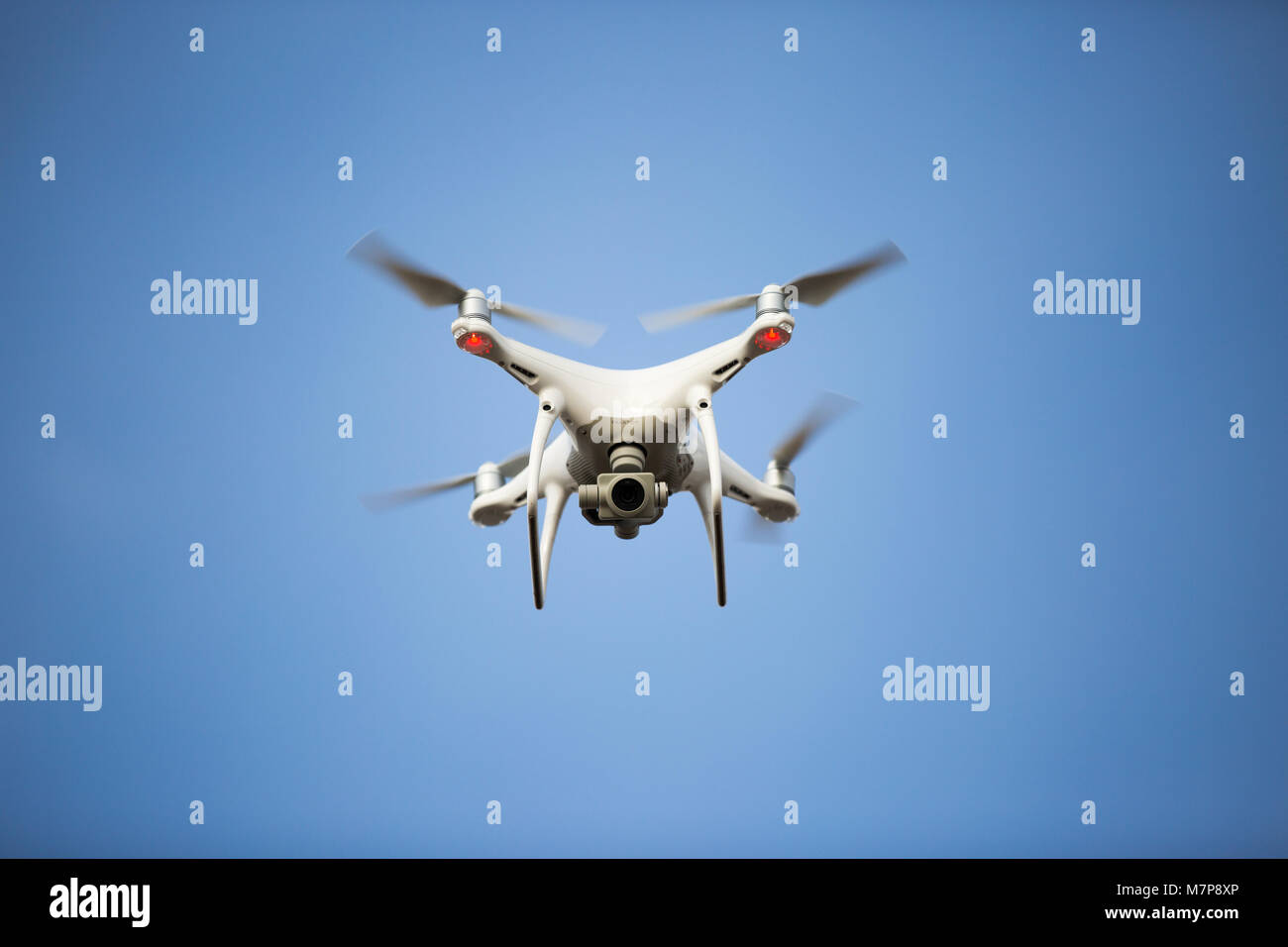 DJI Phantom 4 Pro drone flying Stock Photo - Alamy