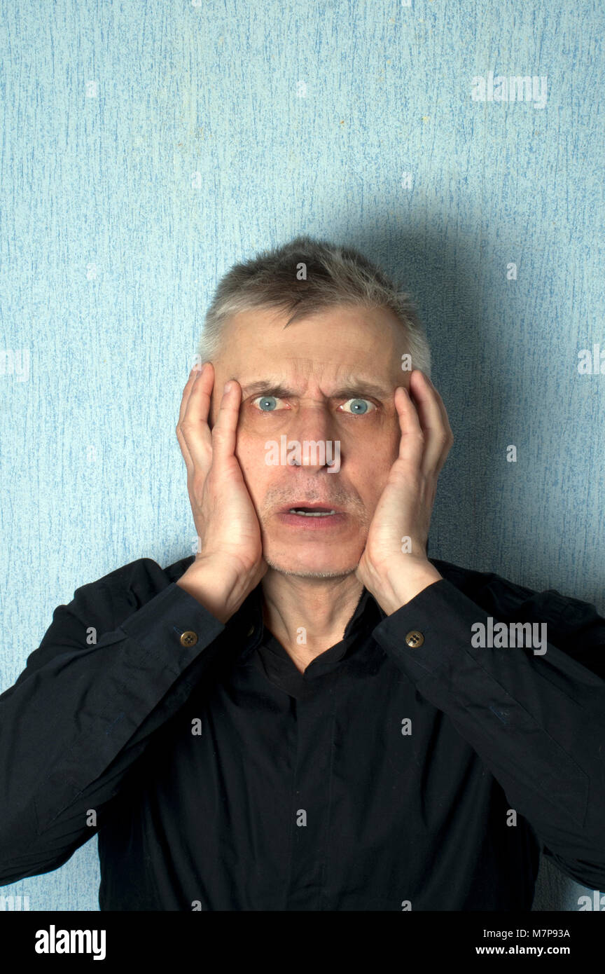 Matured man screaming in stress, vertical studio shot Stock Photo - Alamy