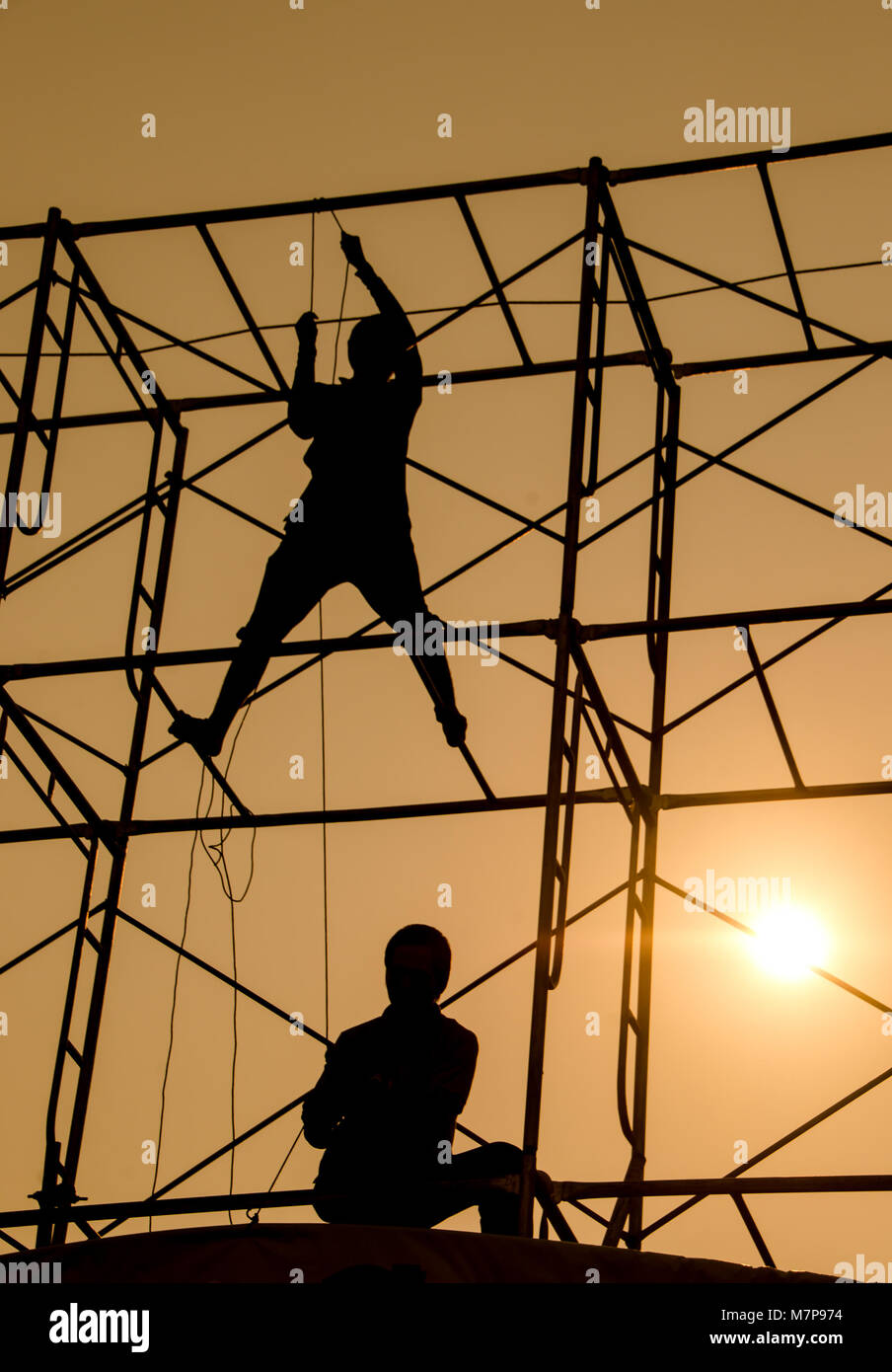 silhouette of man working for construction Stock Photo - Alamy