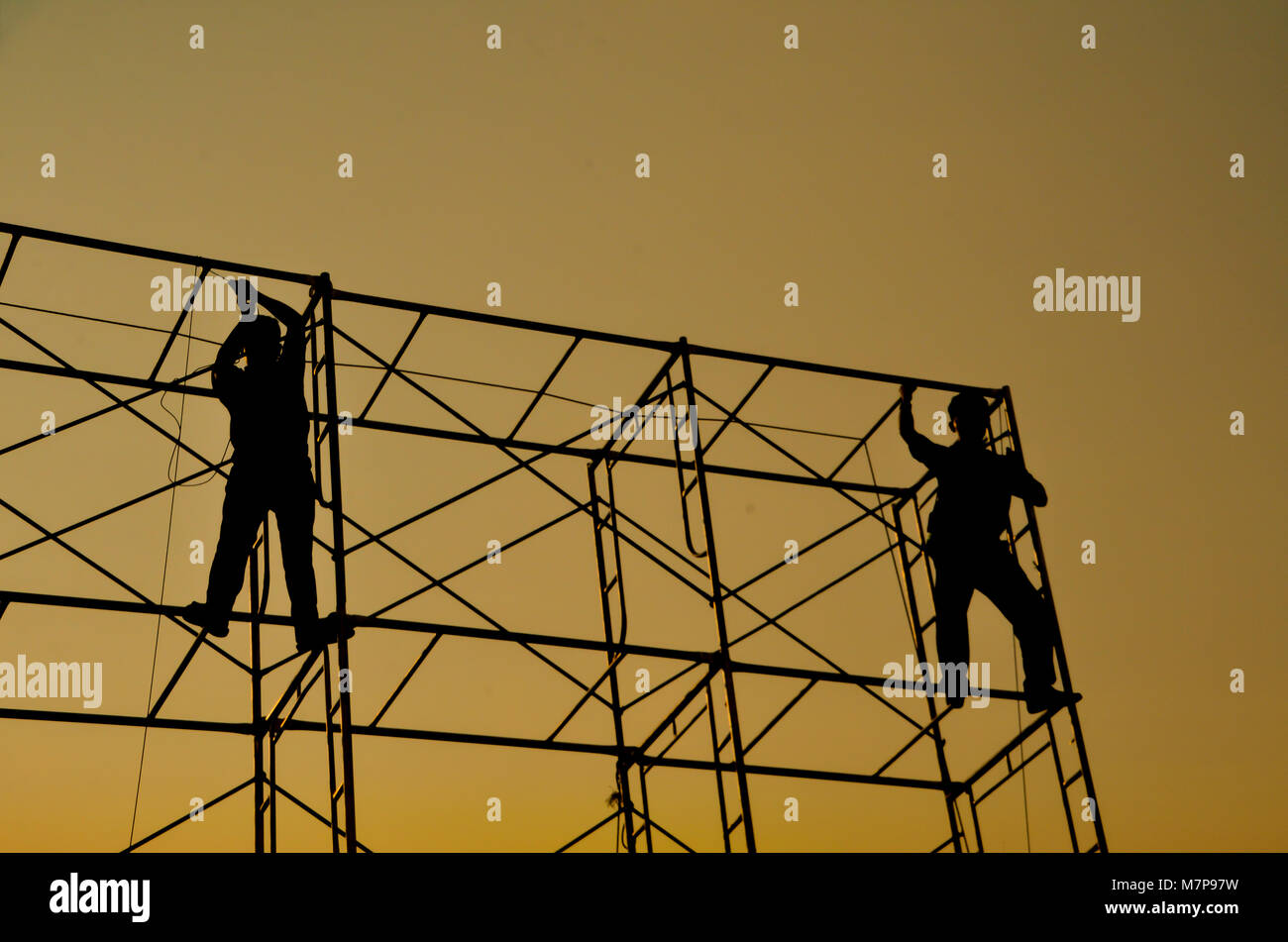 silhouette of man working for construction Stock Photo - Alamy