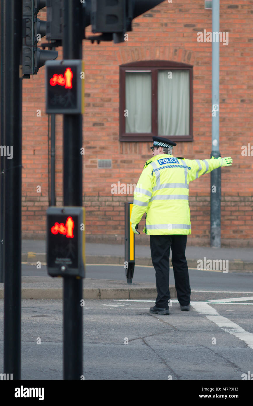 Policeman Hand Signal High Resolution Stock Photography and Images - Alamy