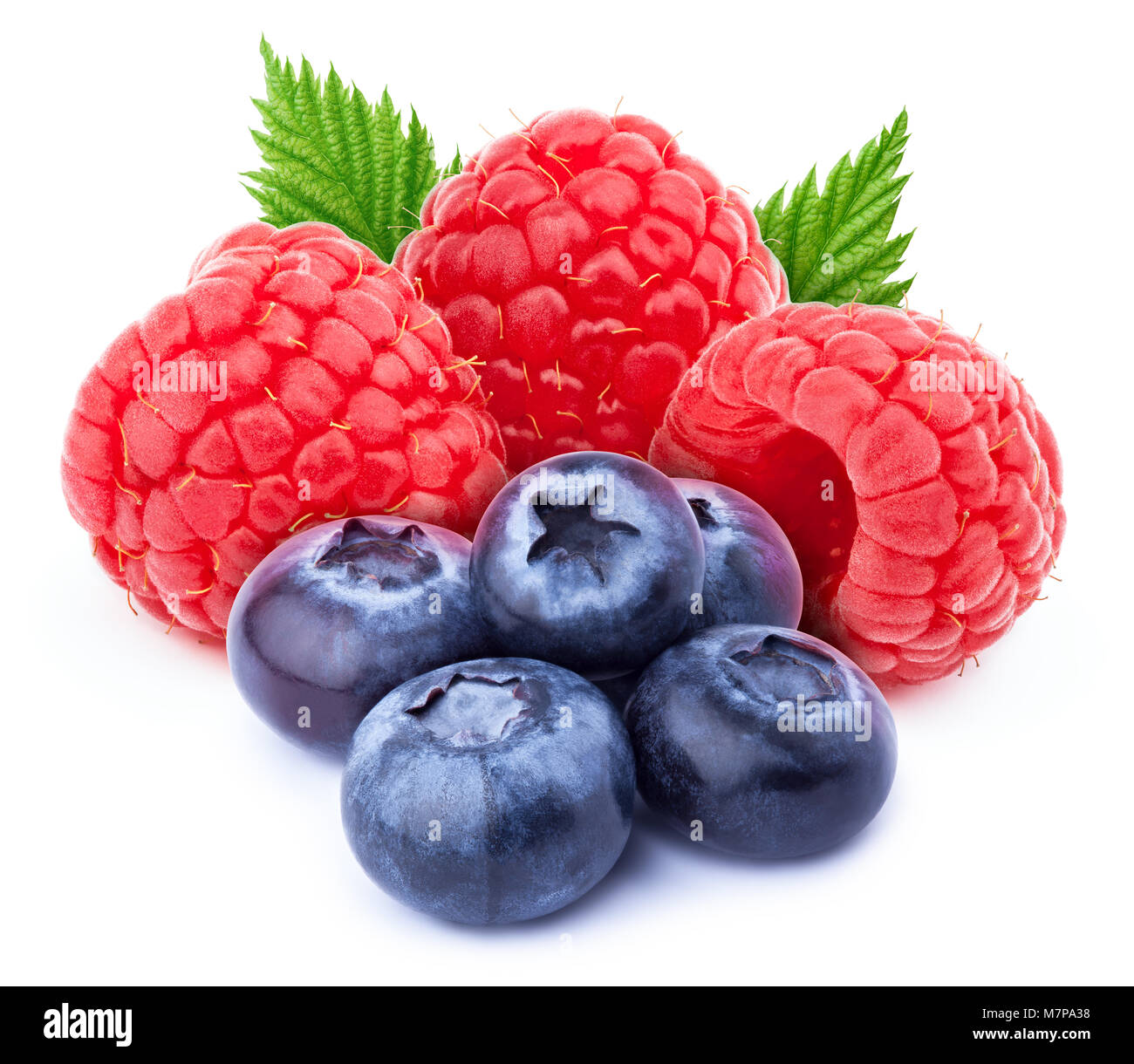 Three ripe raspberries with green leaves and five blueberries isolated ...