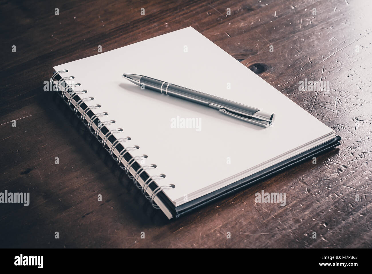 Pencil lying on notepad hi-res stock photography and images - Alamy