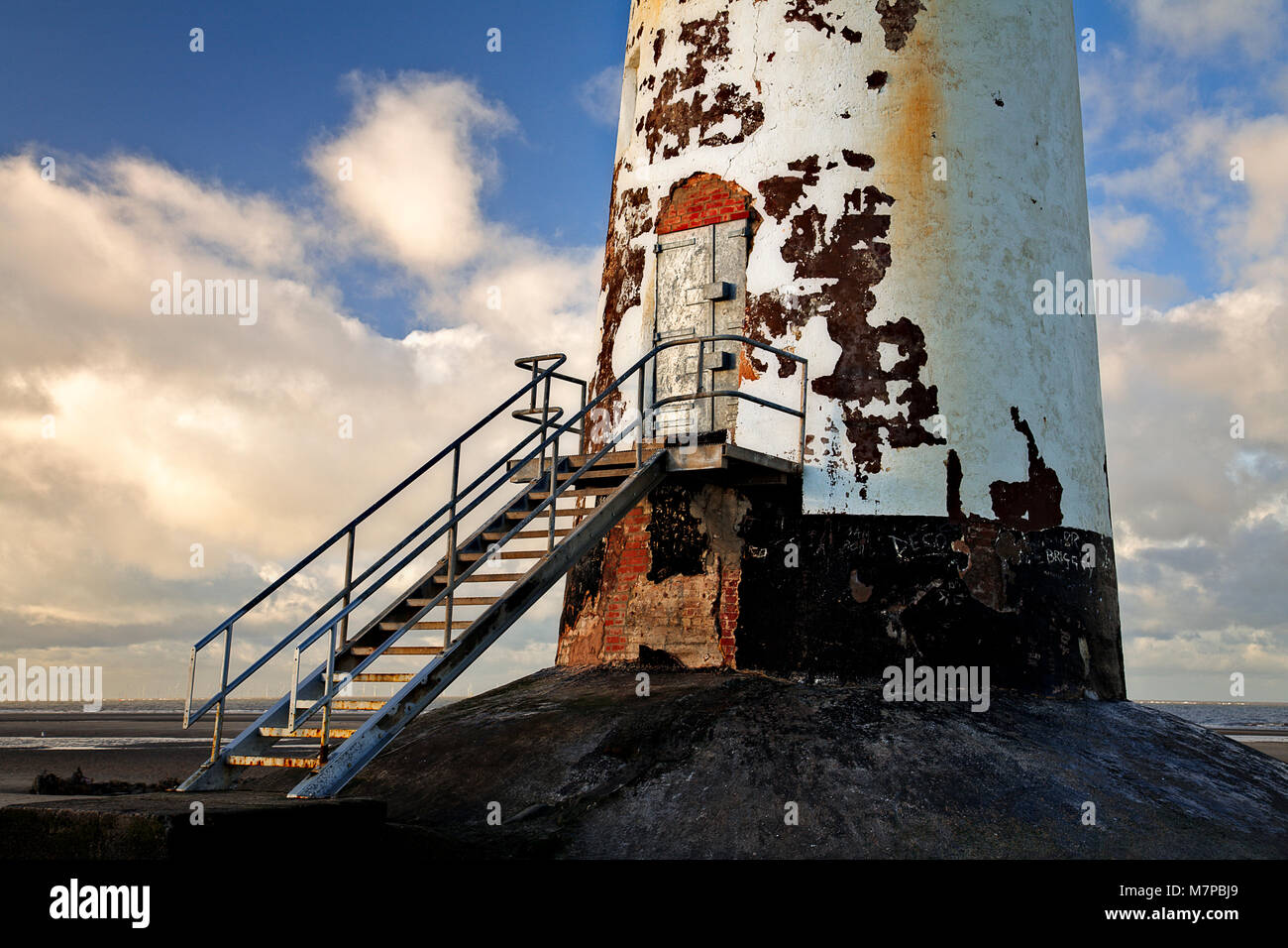 Derelict Point of Ayr lighthouse and steel steps on Talacre beach ...