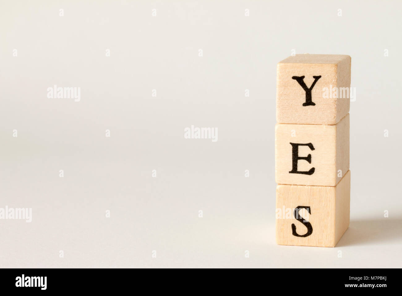 YES word made with building blocks - Sign of acceptance Stock Photo - Alamy