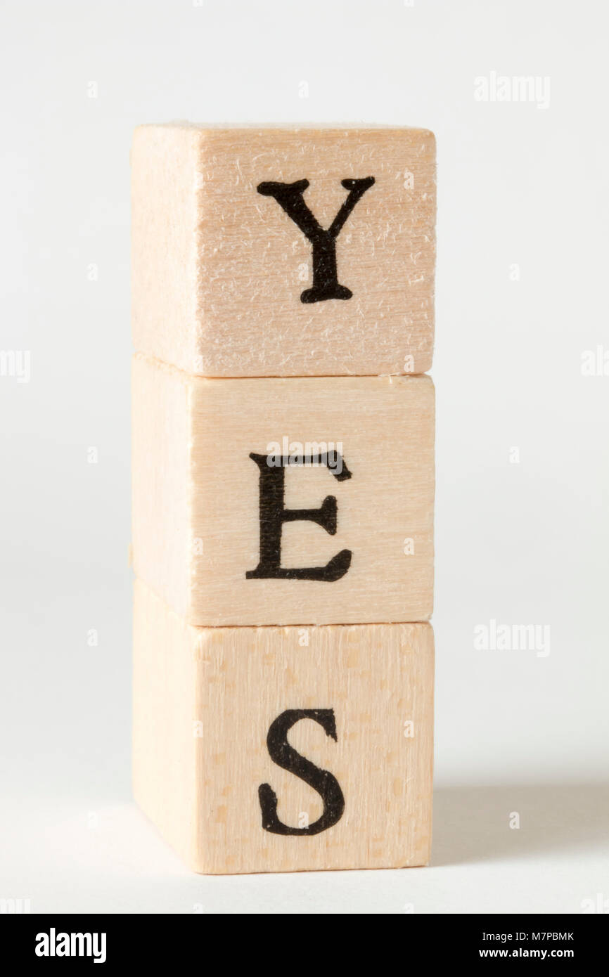 YES word made with building blocks - Sign of acceptance Stock Photo - Alamy