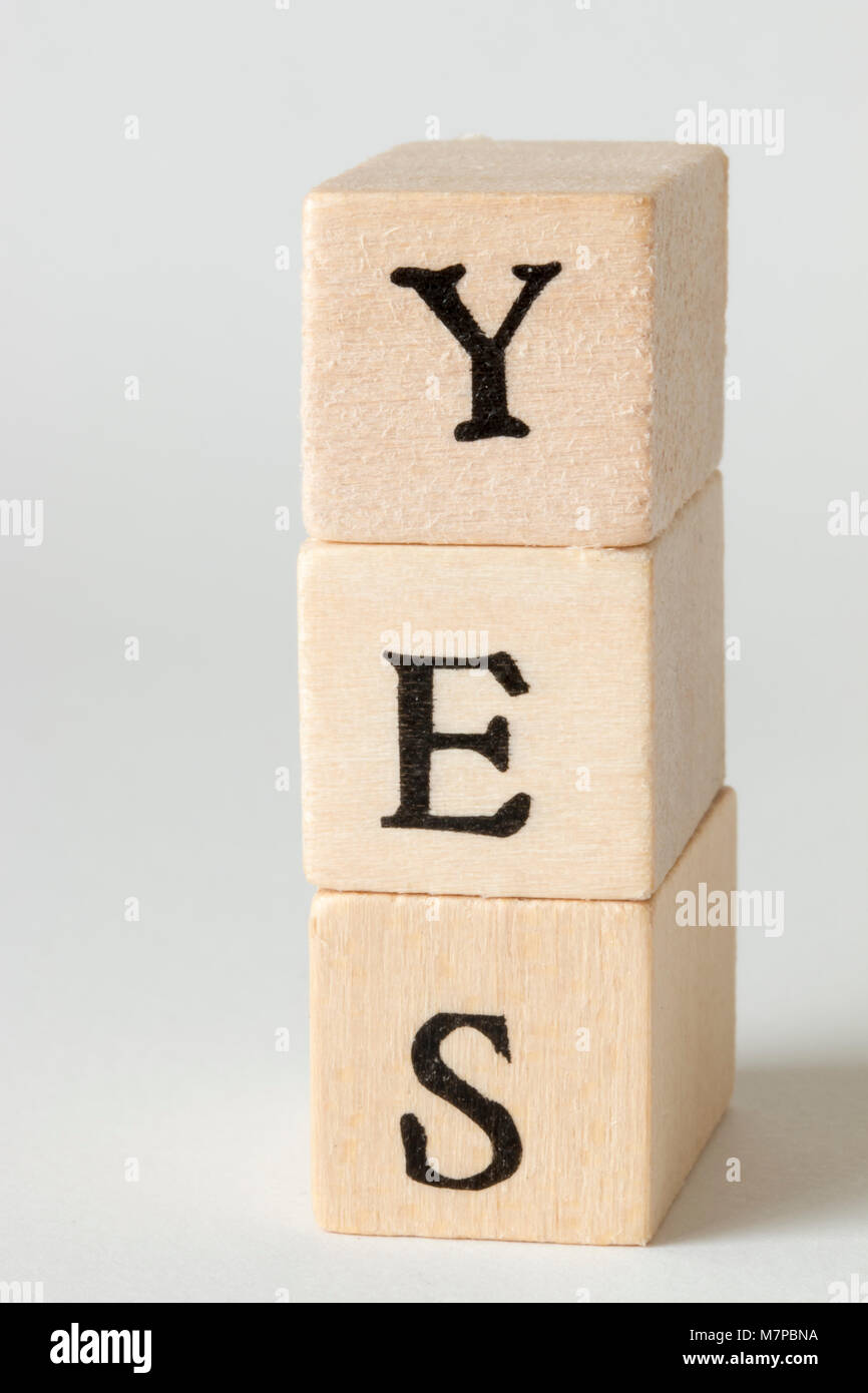 YES word made with building blocks - Sign of acceptance Stock Photo - Alamy