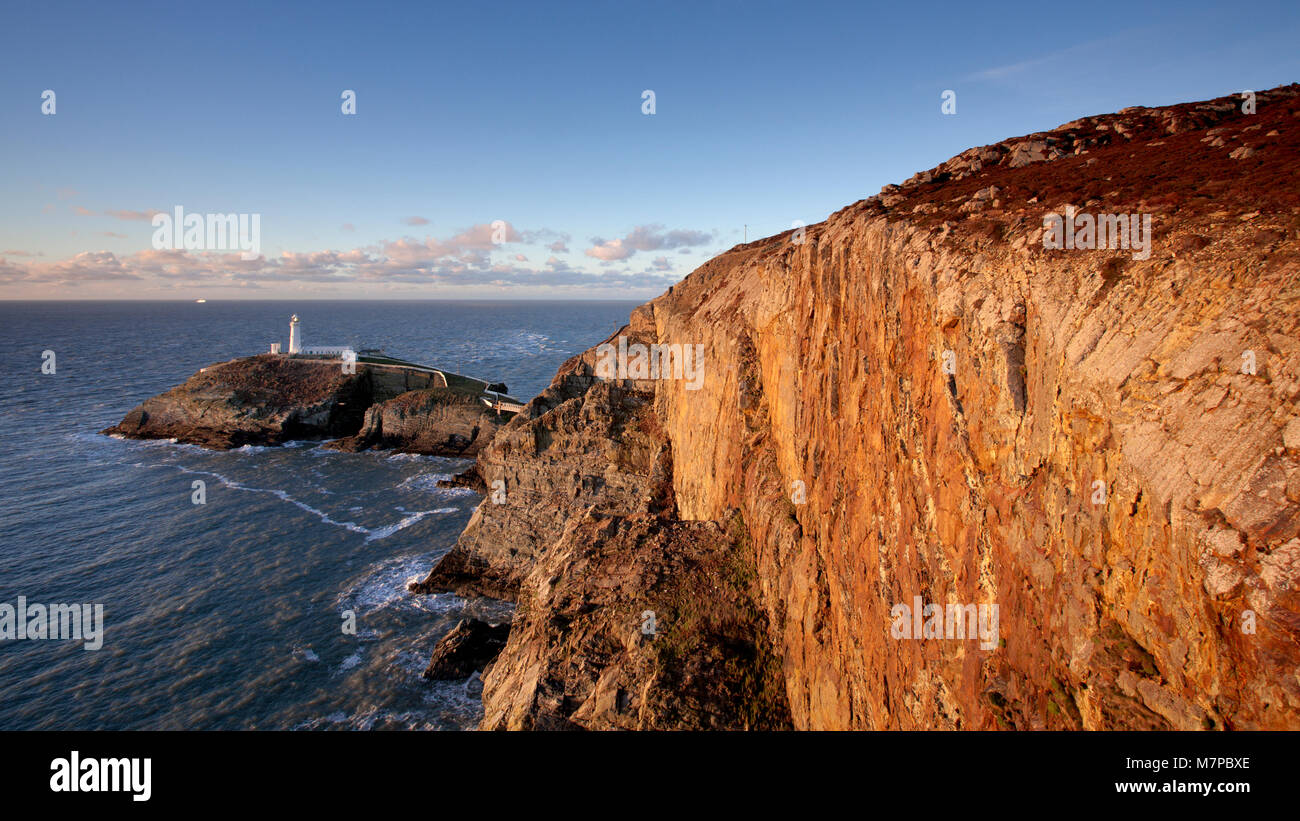 South Stack lighthouse and cliffs, Anglesey, North Wales coast on a ...