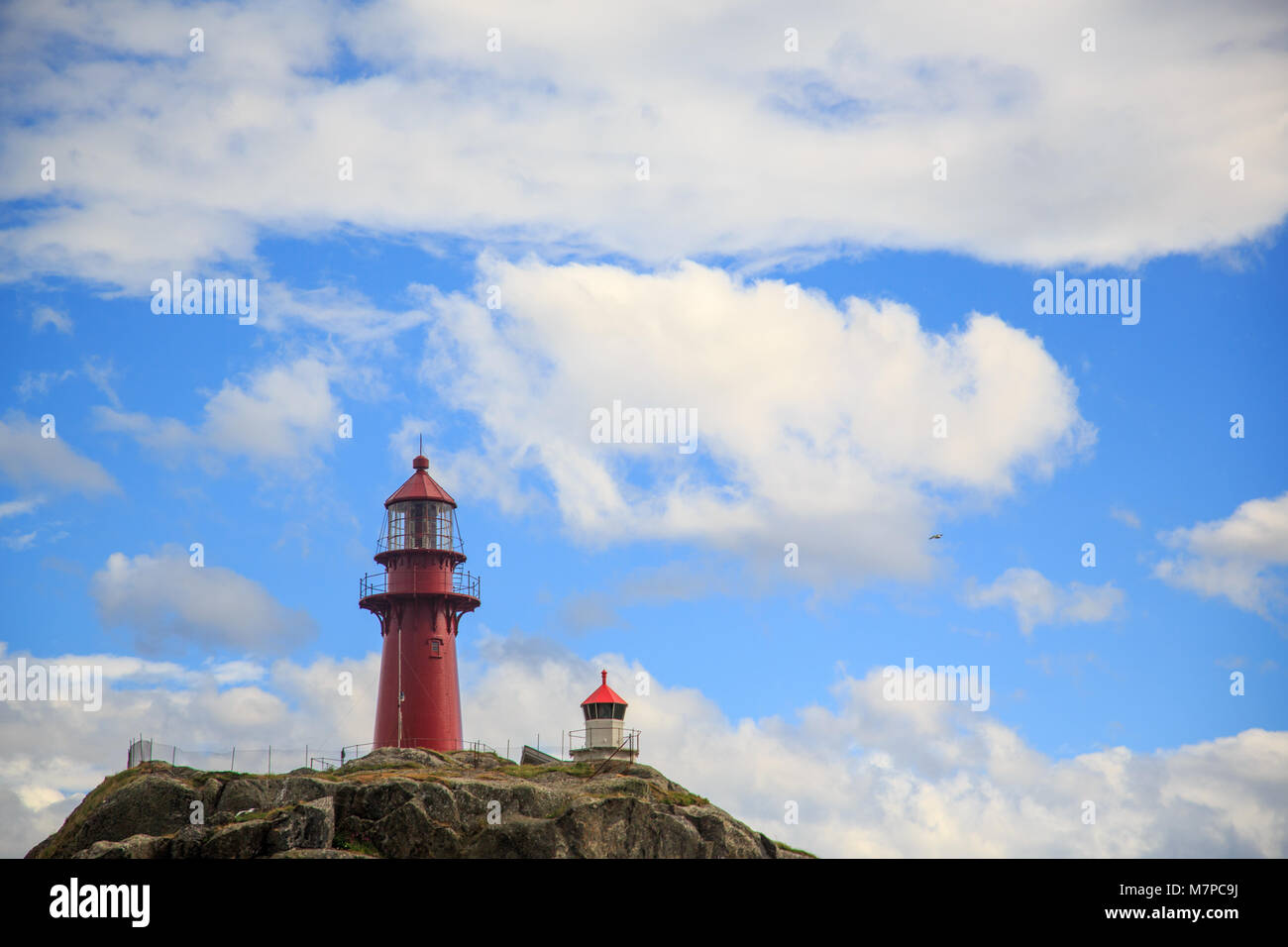 Ona lighthouse on Ona Island - old fishing community in Sandoy ...