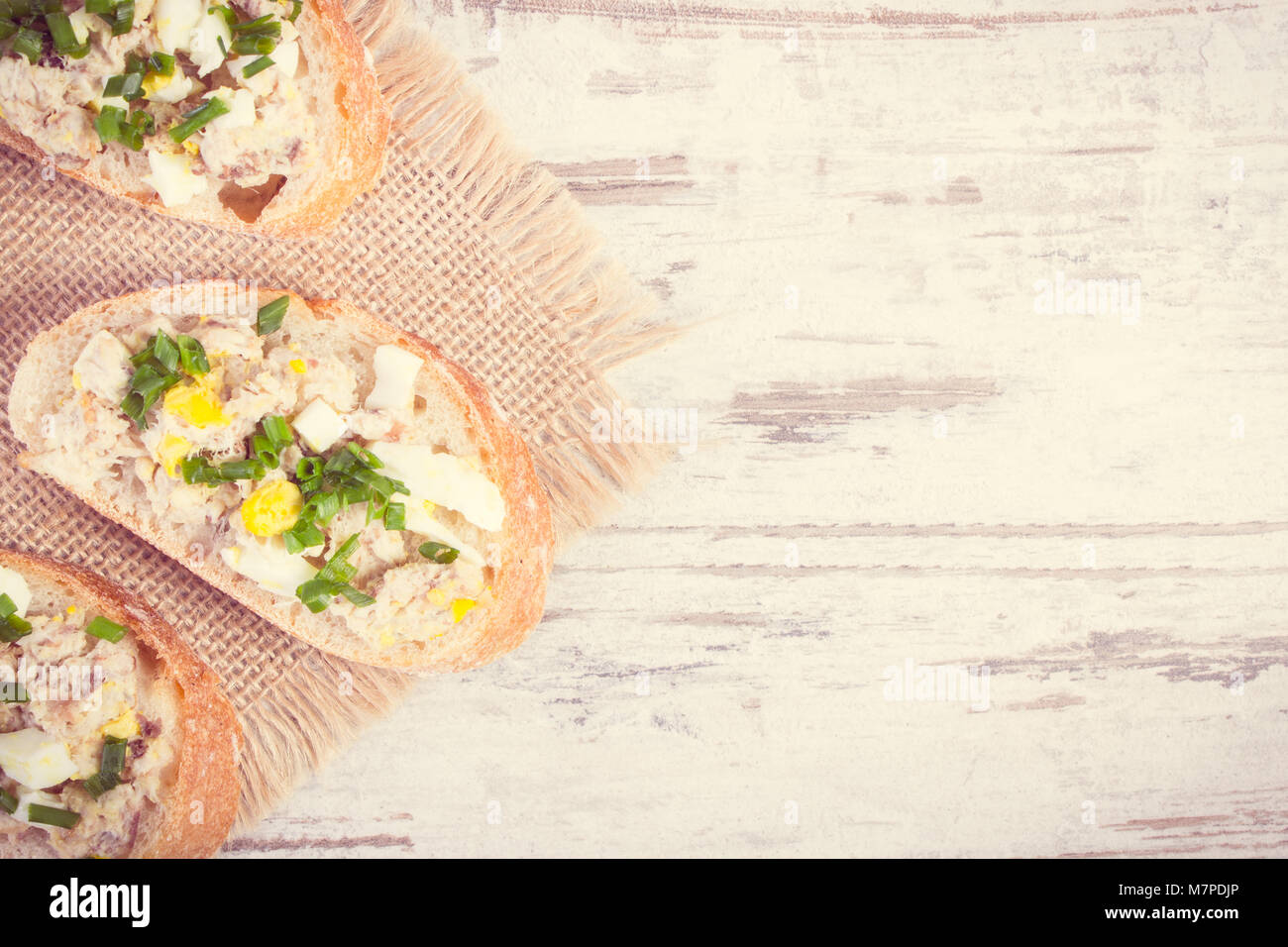 Vintage photo, Baguette with homemade mackerel or tuna fish paste ...