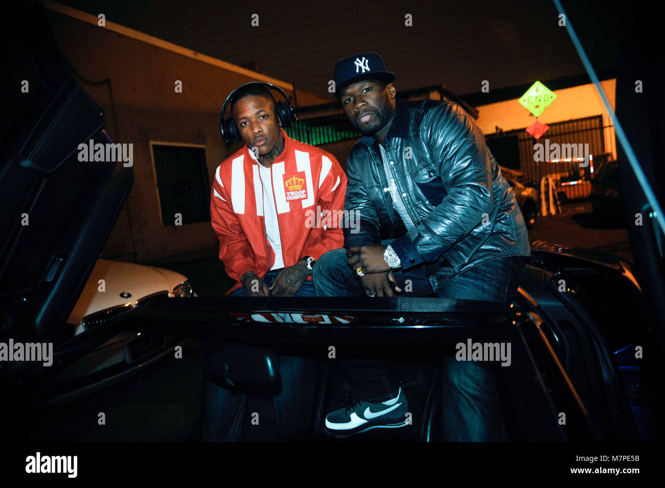(L-R) YG & 50 Cent sitting in a Ferrari on November 18, 2010 in Los ...