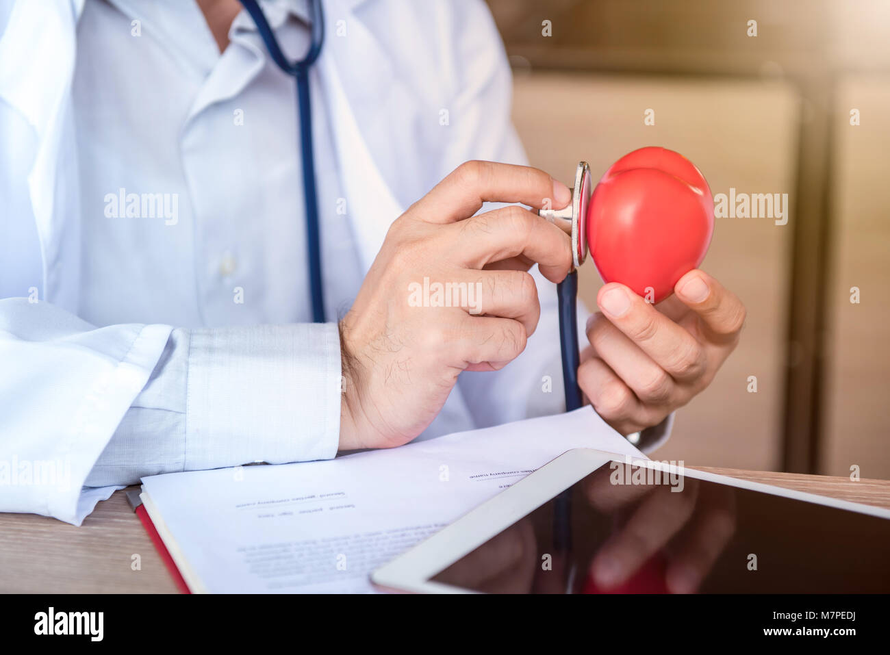 doctor, physical examination and Heart Disease Checker Stock Photo - Alamy