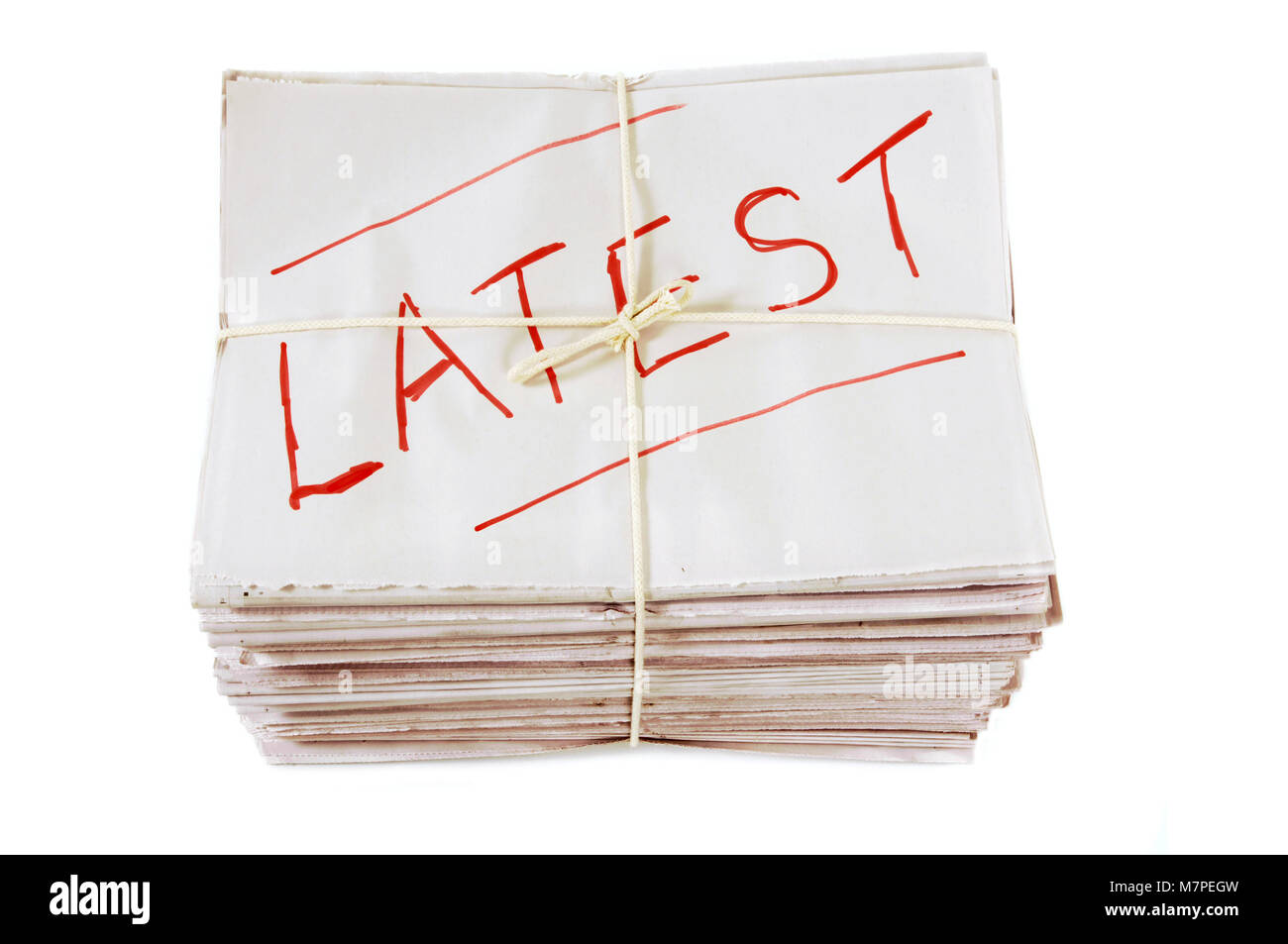 Latest edition newspapers tied with rope Stock Photo - Alamy