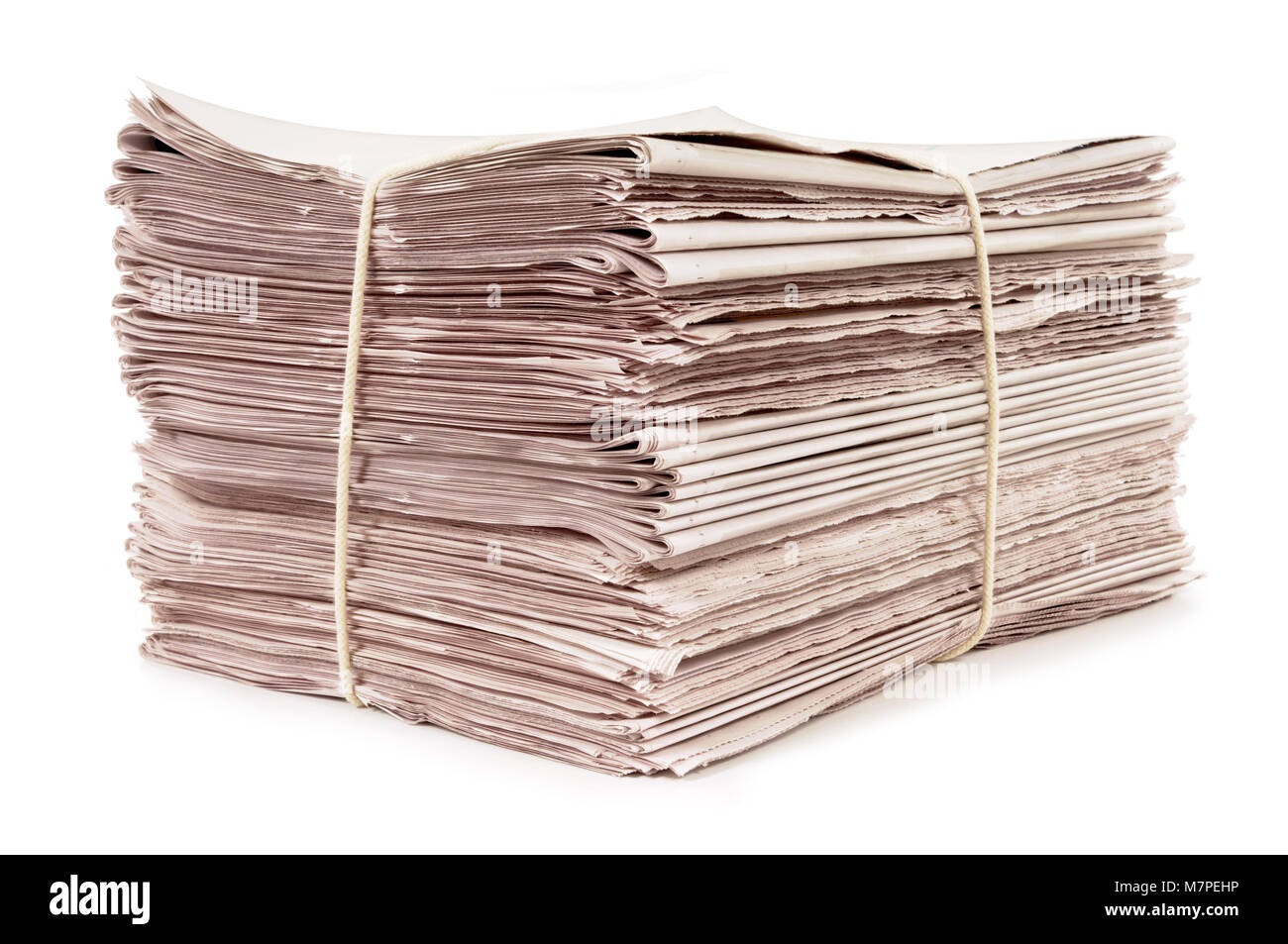 Bundle of new newspapers tied with rope Stock Photo - Alamy