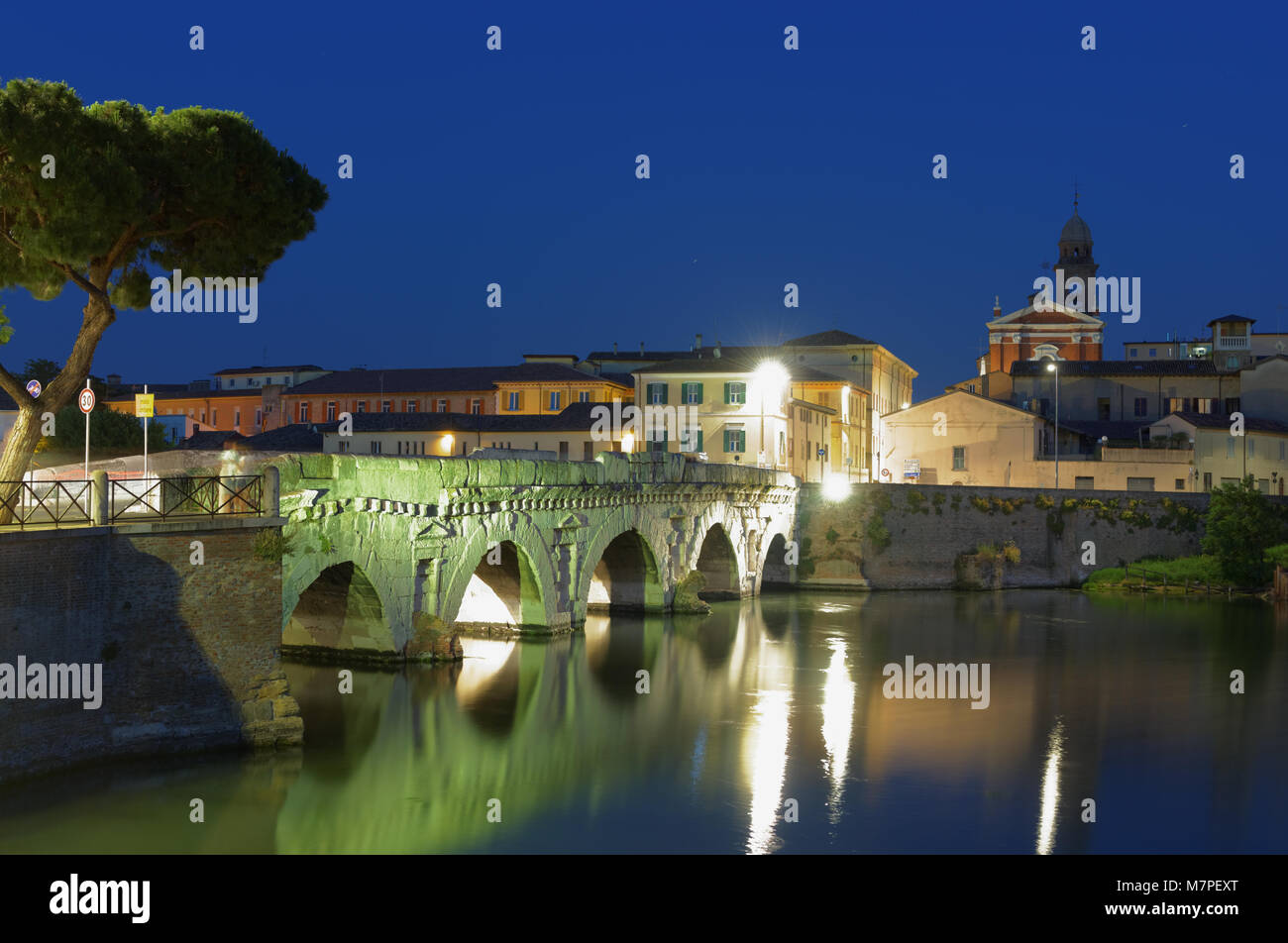 Rimini, Italy - June 13, 2017: Night view to the bridge of Tiberius ...