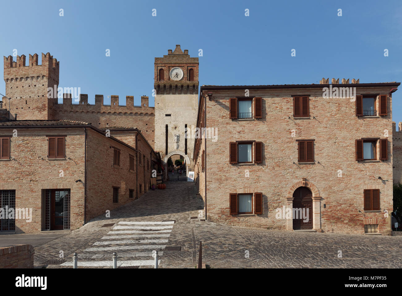 Gradara, Italy - June 16, 2017: Tourists going by the Umberto I street ...