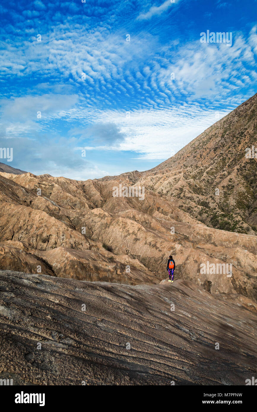 Taking a walk on the crater rim of Mount Bromo in Indonesia under the ...