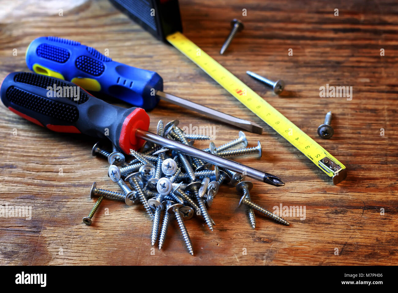 screws and screwdriver stack Stock Photo - Alamy