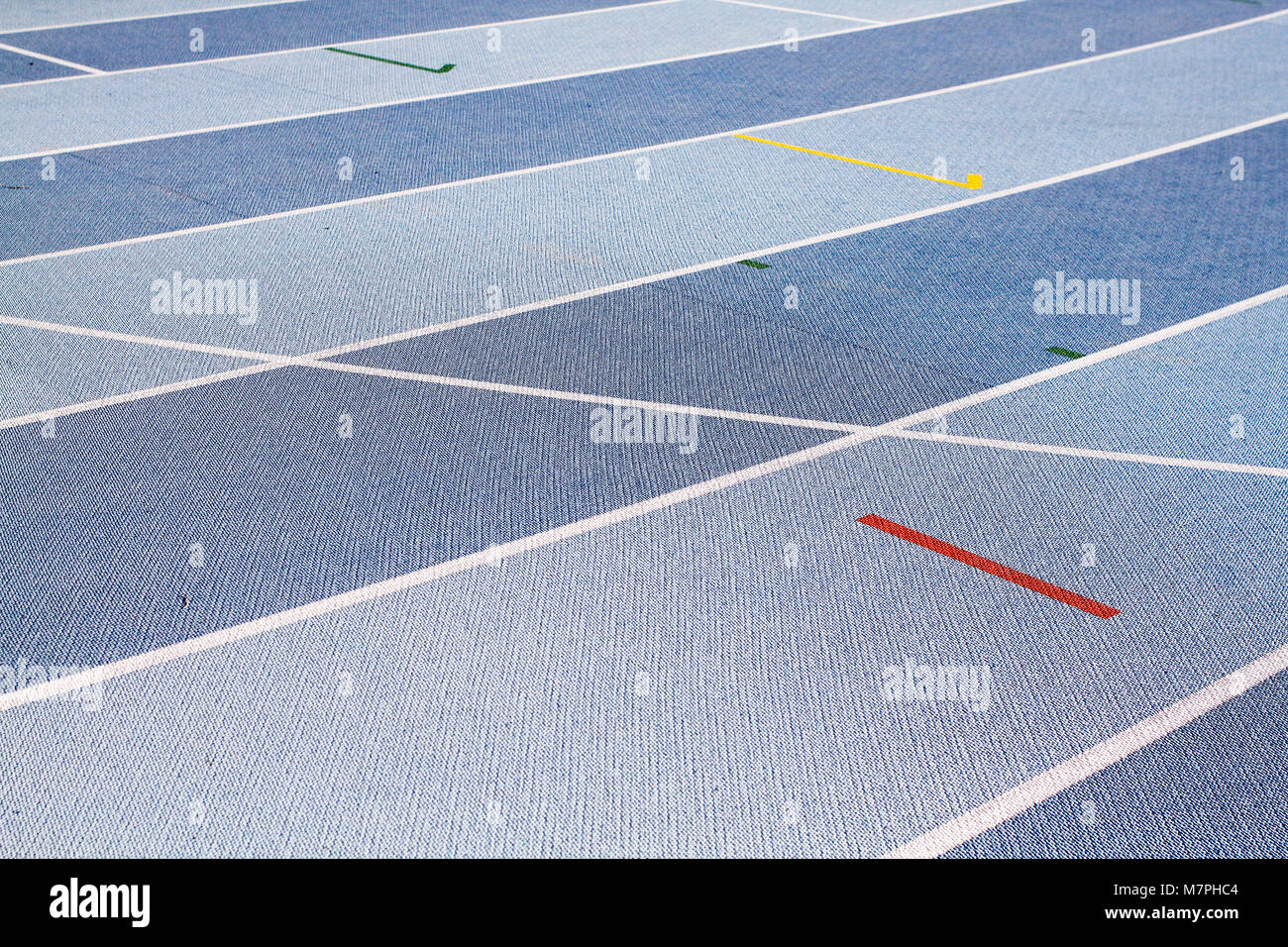 Background image of blue tracks on a running circuit Stock Photo - Alamy