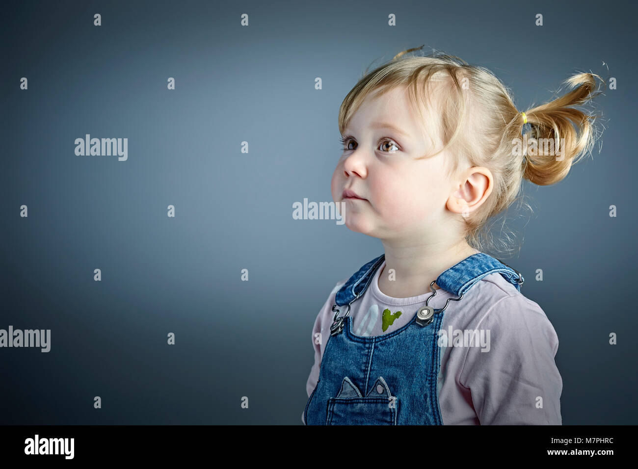 portrait of cute female child studio shot Stock Photo - Alamy
