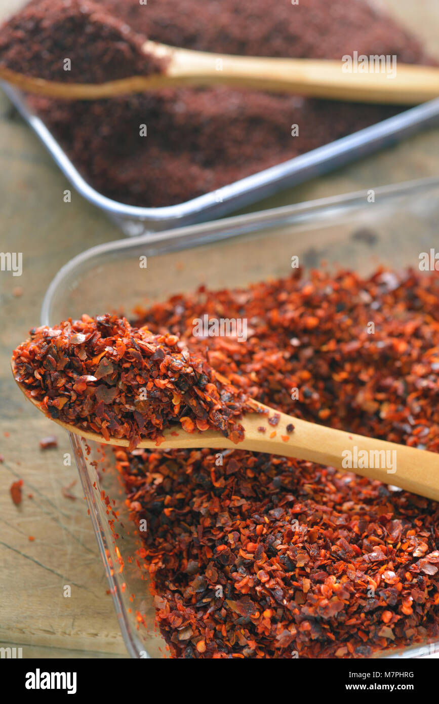 Traditional Middle-Eastern spices Aleppo pepper and sumak in wooden ...