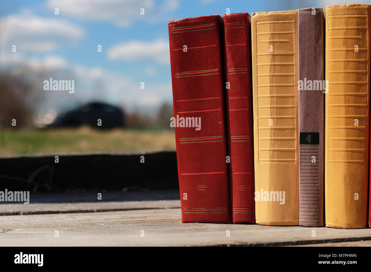 books standing on a table Stock Photo - Alamy