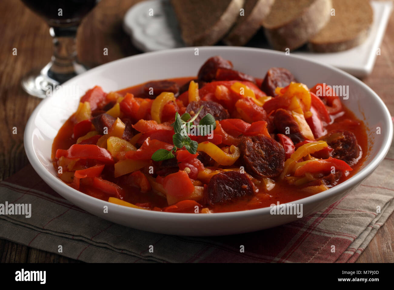 Traditional Hungarian Lecso with spiced sausage on a plate Stock Photo ...