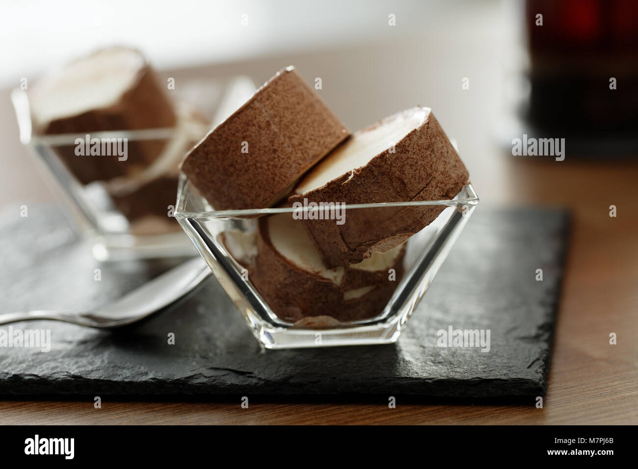 Ice cream in a square glass bowl closeup Stock Photo - Alamy