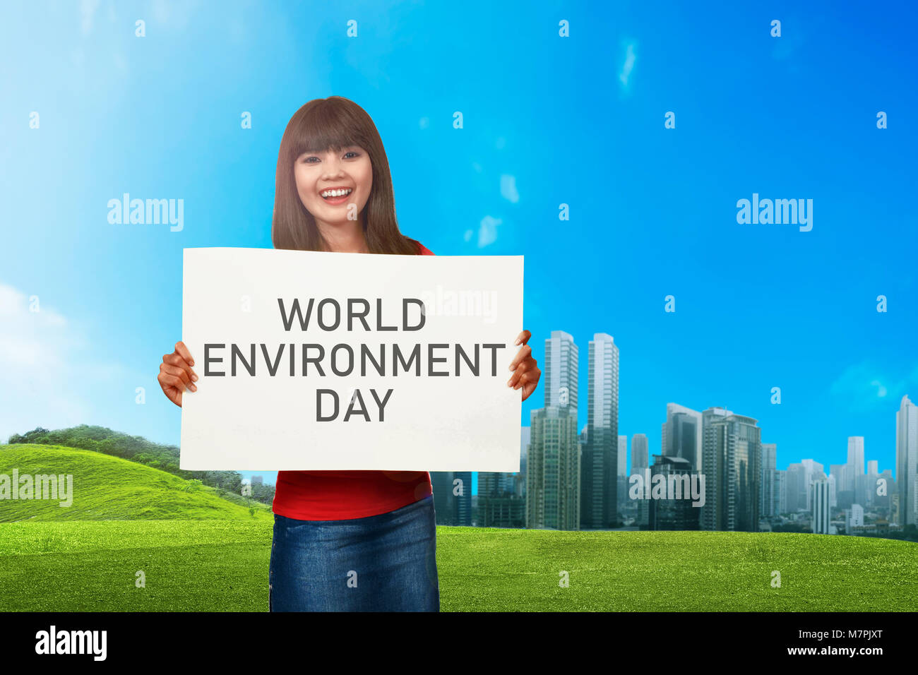 Young asian woman holding white board with World Environment day ...