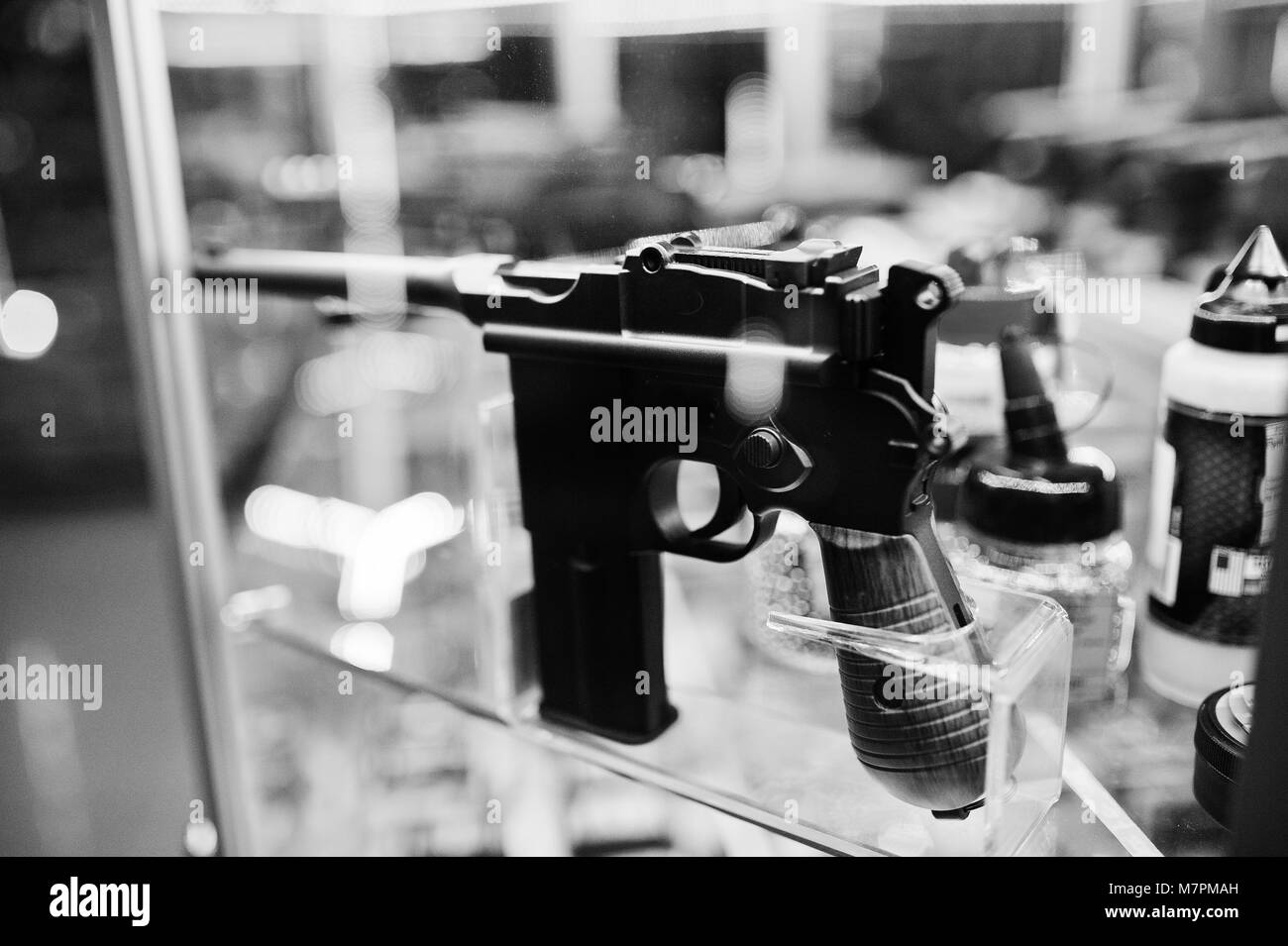 Old retro gun on shelves store weapons on shop center Stock Photo - Alamy