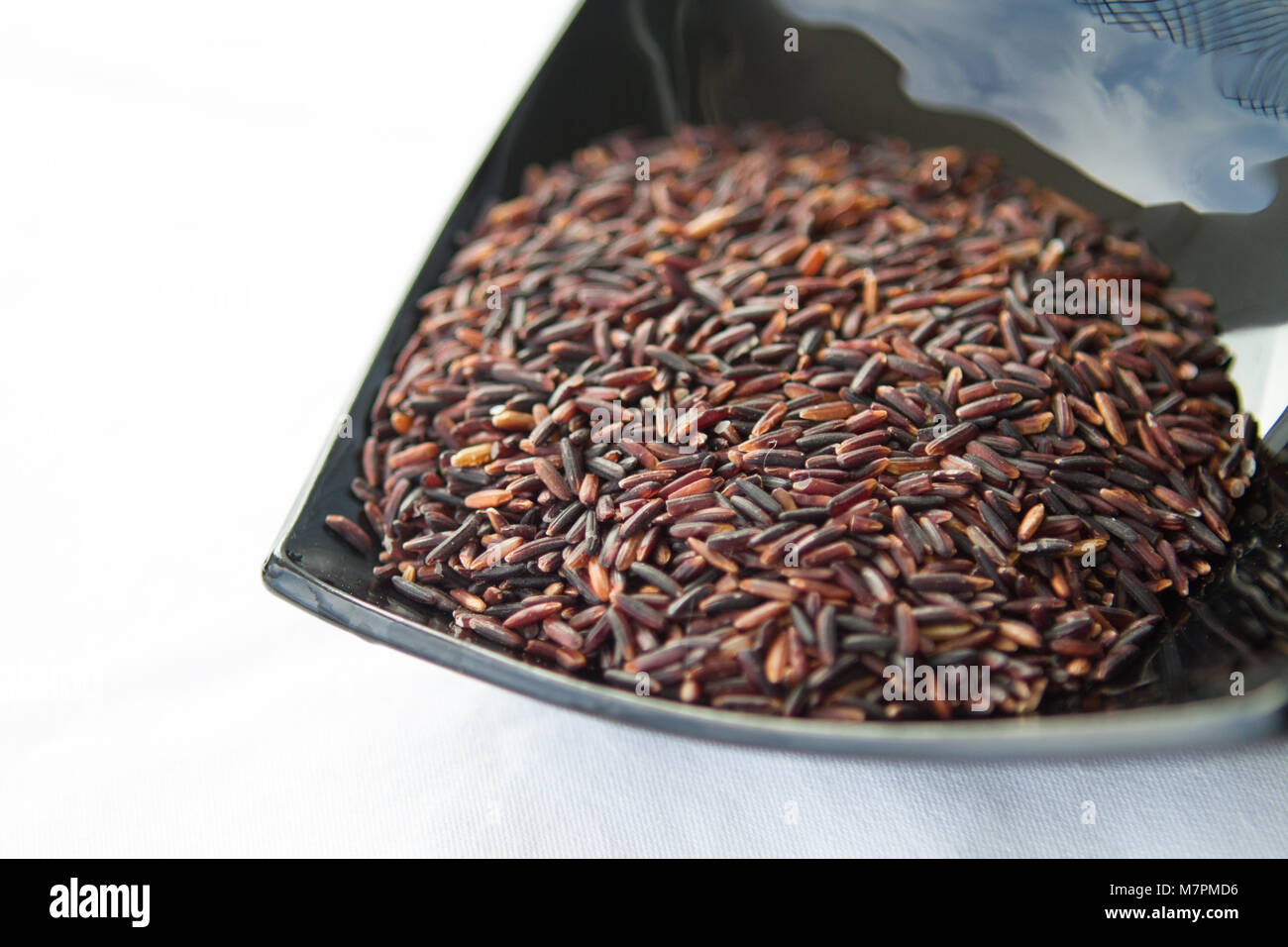 Wild rice grains, vegetarian exotical food Stock Photo - Alamy