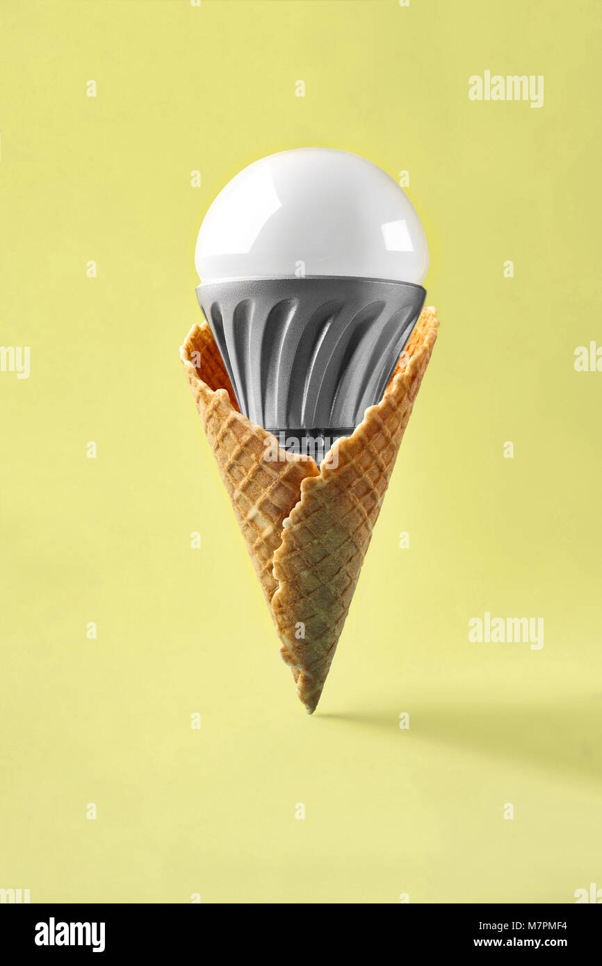 Led lamp in ice cream cone, innovation concept Stock Photo - Alamy