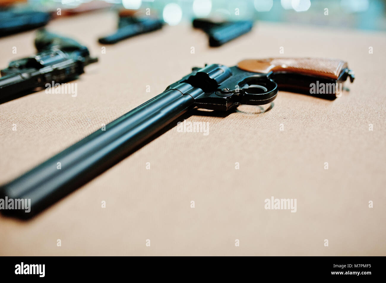 Close up revolvers guns on shooting range Stock Photo - Alamy