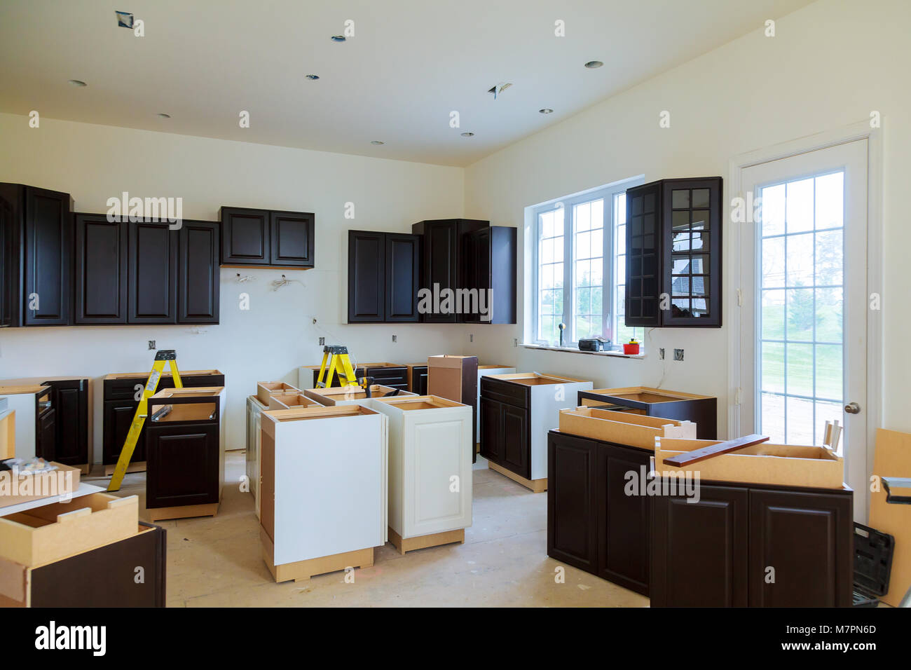 Installing new induction hob in modern kitchen kitchen Installation of ...