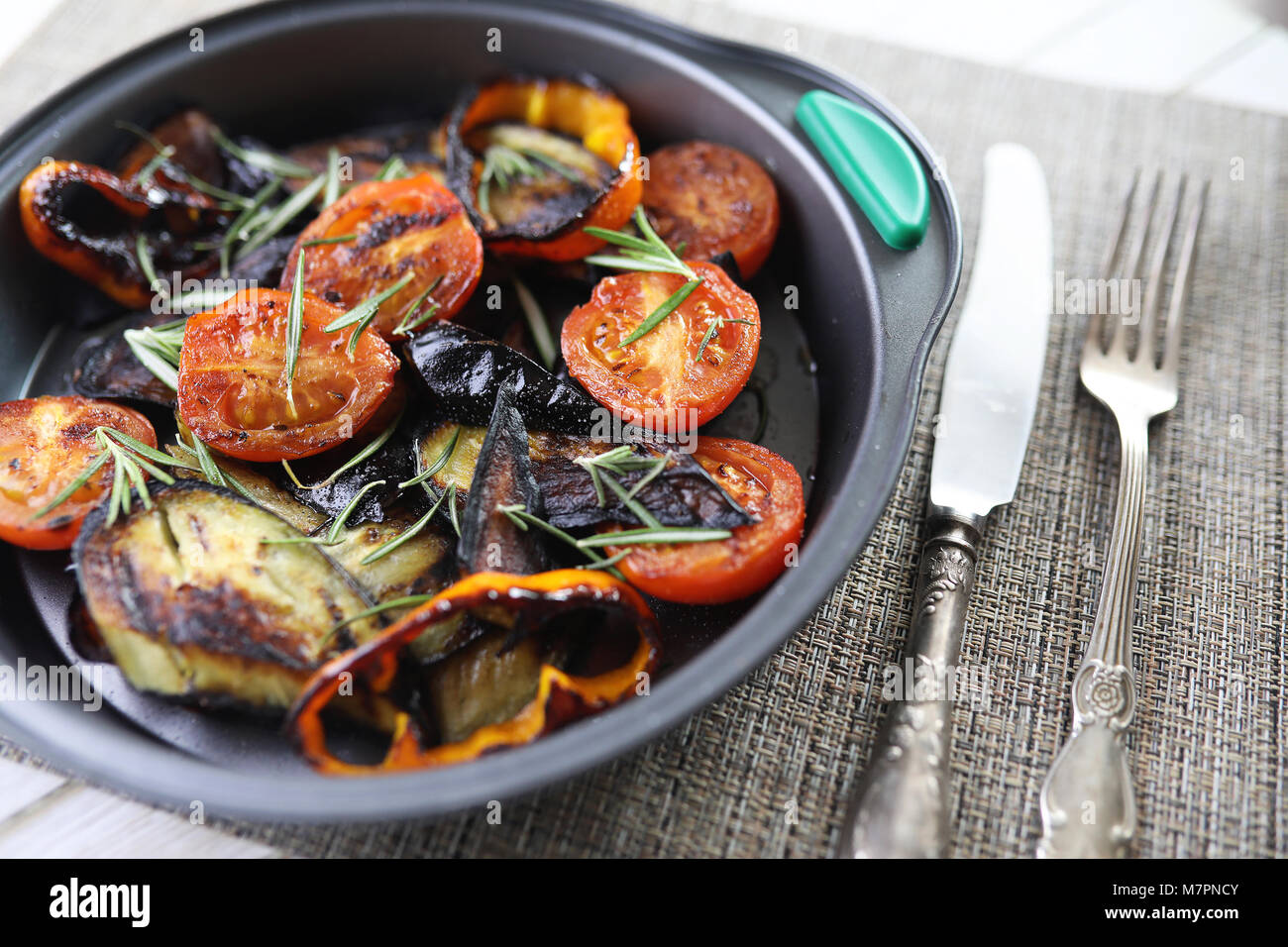 Vegetables grilled pan fried eggplant and tomatoes Stock Photo - Alamy