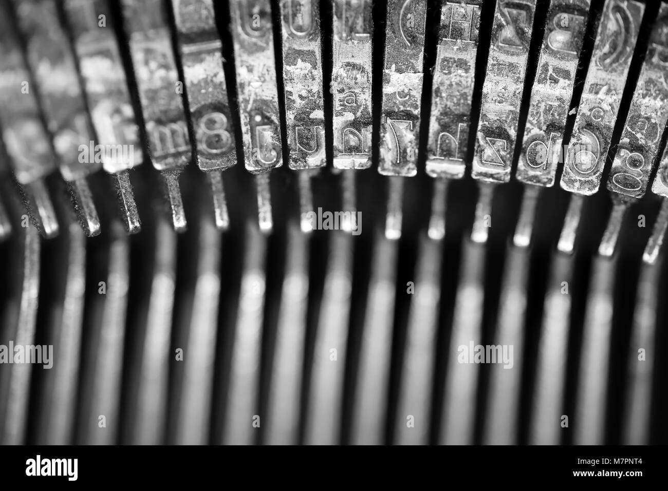 Different small metal elements of an old typewriter Stock Photo - Alamy