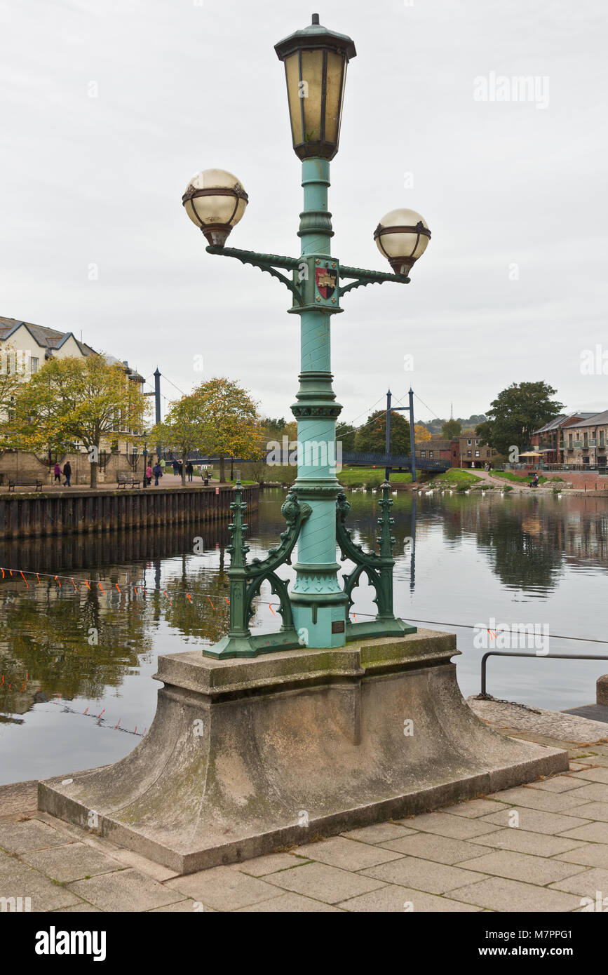 Historic old style lamp post on the edge of the Exeter Canal, part of ...